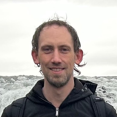 Reading the human genome: a genetic language model to predict disease risk